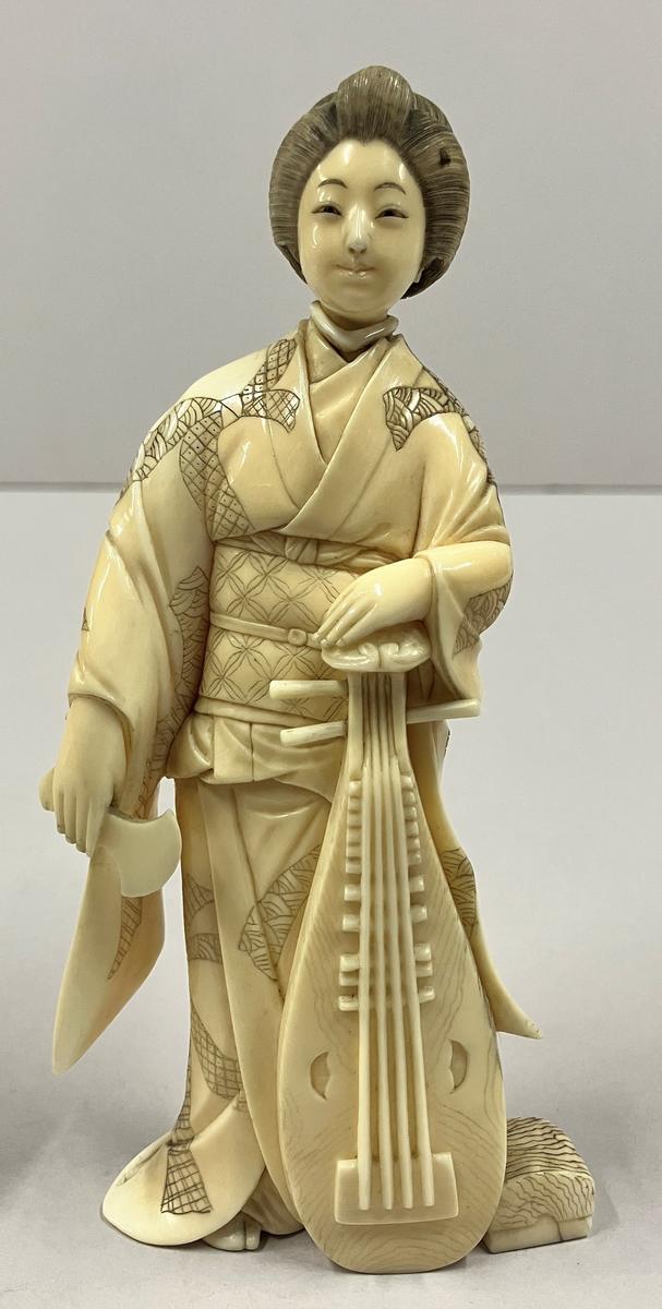 Onna biwashi [woman player of a biwa]; Standing figure of a woman with ...